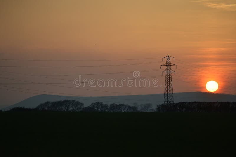 Sunset pylons stock image. Image of electricity, poles - 89929485