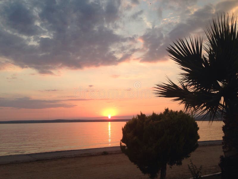Sunset on the Quiet and Desert Beach Stock Photo - Image of nature ...