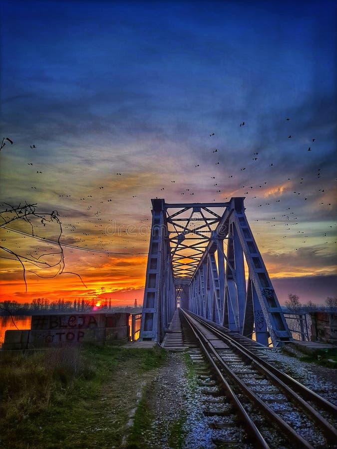 Sunset Railroad Bridge stock photo. Image of bridge - 305943166