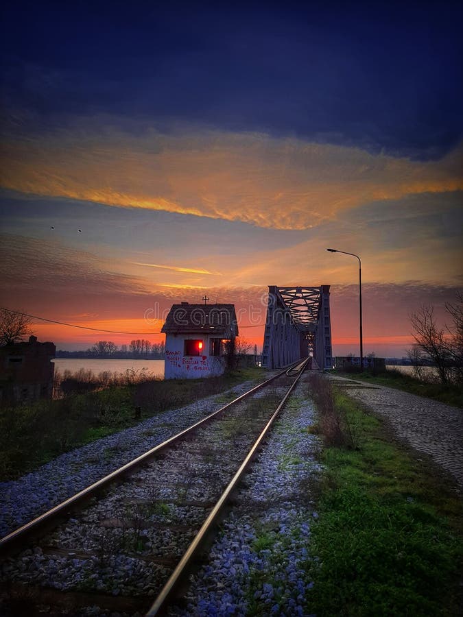 Sunset and railway bridge stock photo. Image of railwaybridge - 305070248