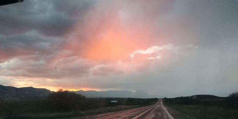 Sunset through rain stock photo. Image of turns, sunset - 100761426