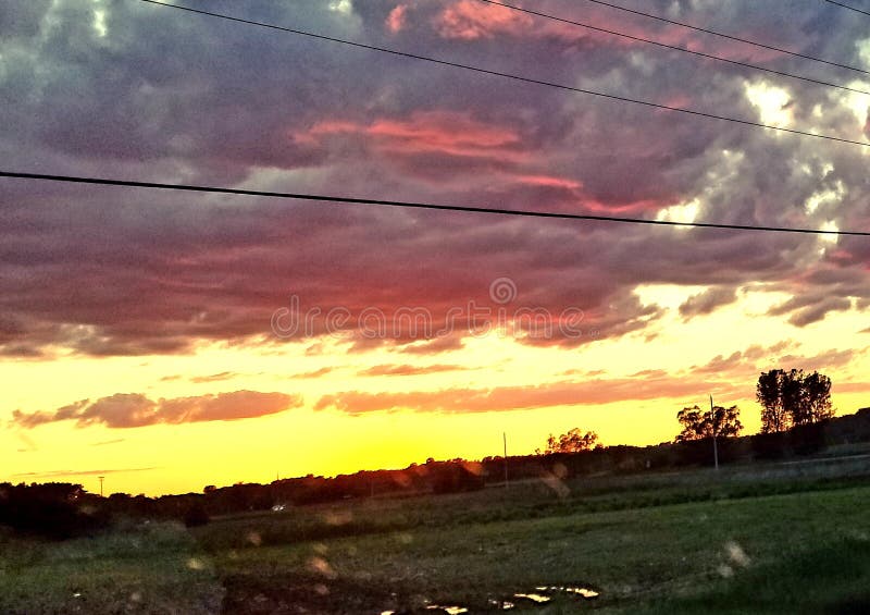 Sunset after a rainstorm stock image. Image of backroads - 168509063