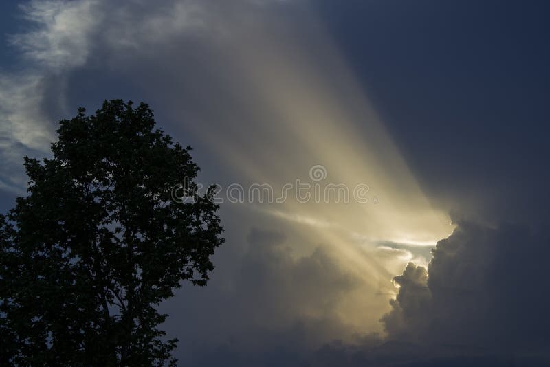 Sunset rays stock image. Image of cloud, glowing, sunbeam - 54409019