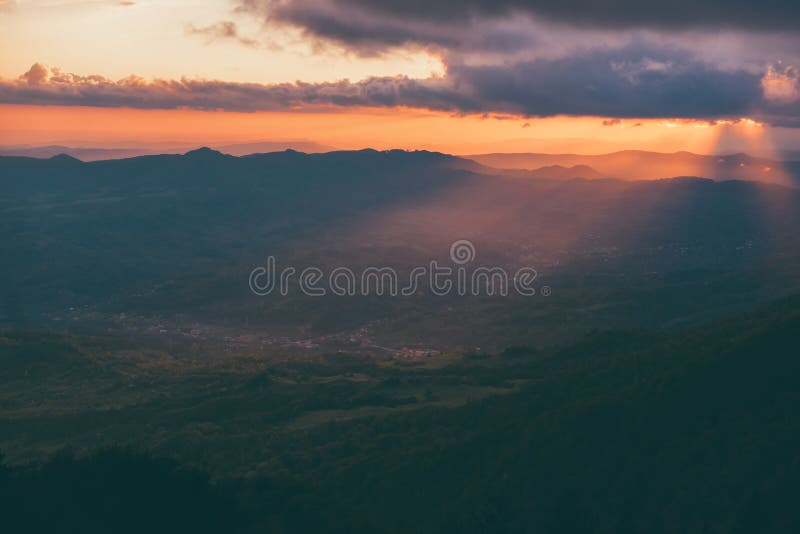Stunning Alpine Landscape with Golden Skies and Dramatic Clouds Stock ...