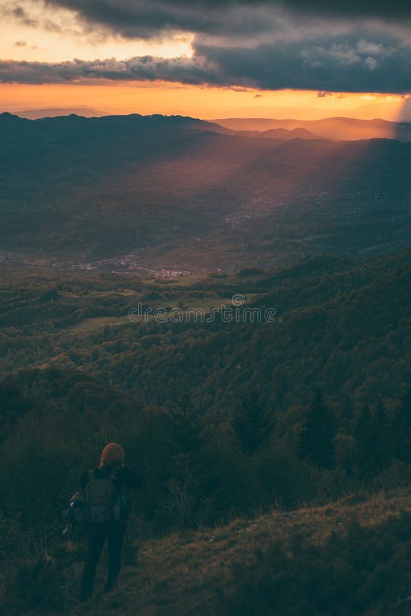 Stunning Alpine Landscape with Golden Skies and Dramatic Clouds Stock ...