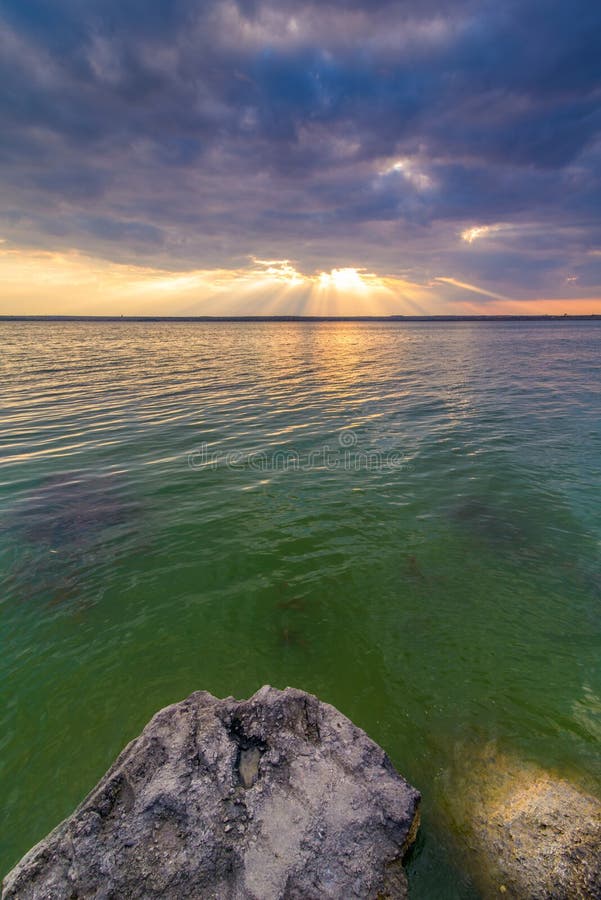 Sunset with rays of light stock image. Image of clouds - 33581845