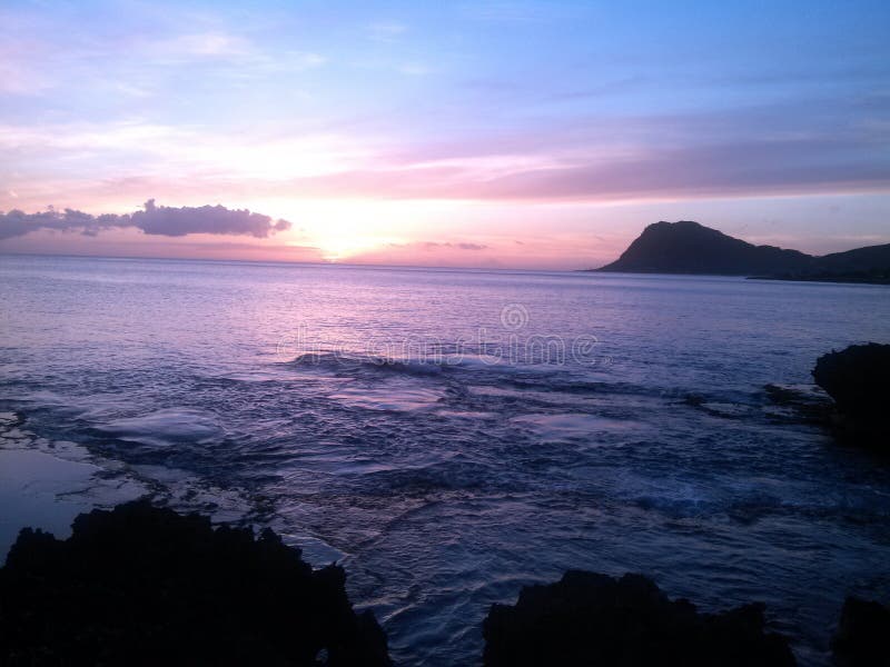 Sea at sunset with reef. stock image. Image of reef, sunset - 91919179