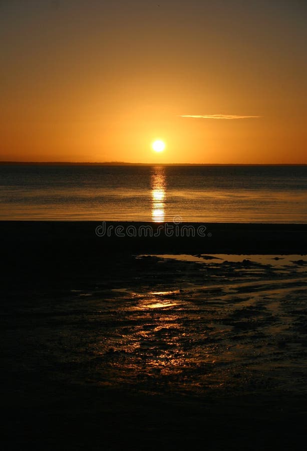 Sunset Reflected in Ocean stock photo. Image of reflection - 148124