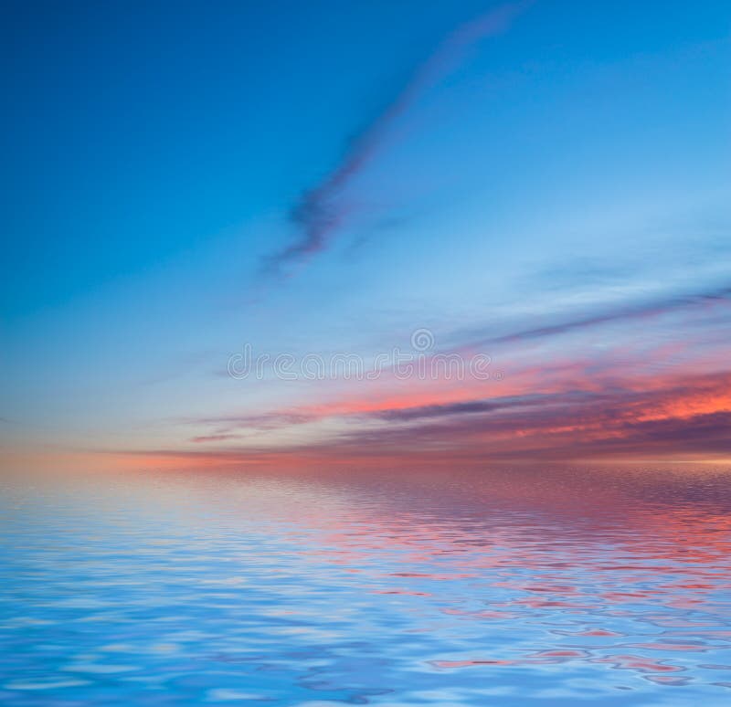Sunset reflected in water. stock image. Image of color - 41268089