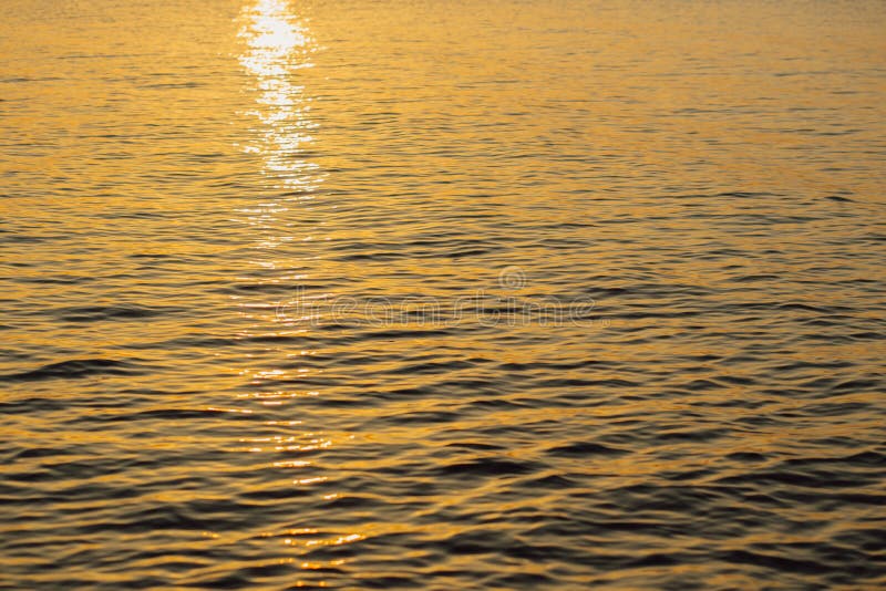 Reflection of the Setting Sun on the Sea Water. Sunset Reflected on the ...