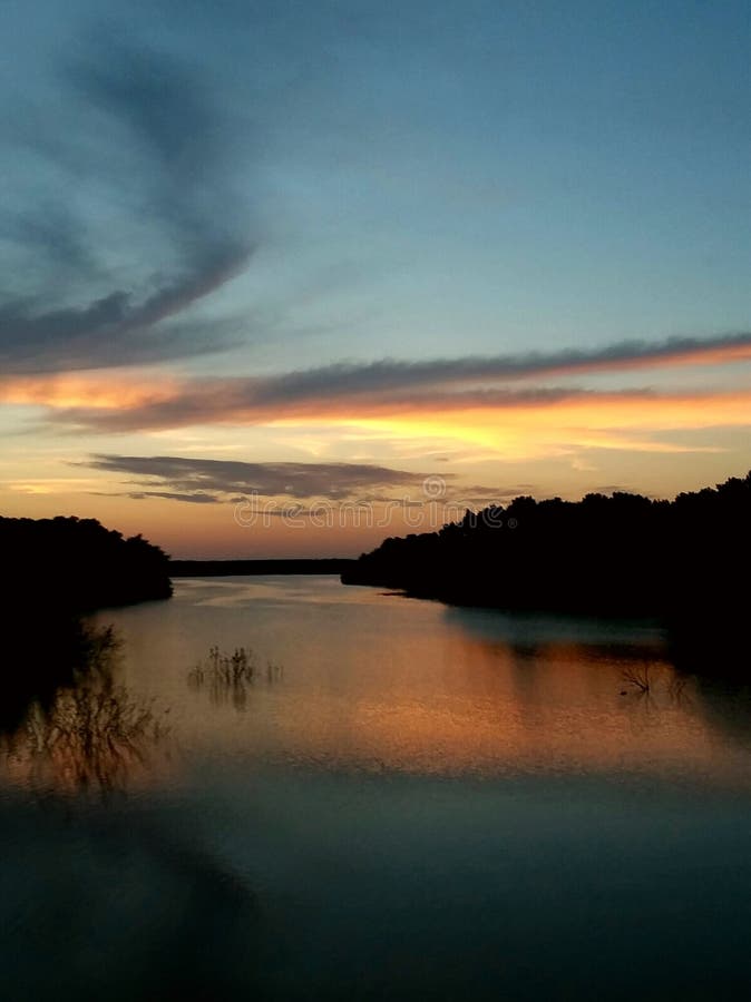 Sunset and Reflection on Floud Water at Dike Stock Foto - Image of dijk ...