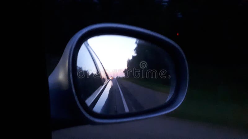 Sunset in the Reflection of the Side Mirror of the Car Stock Photo ...