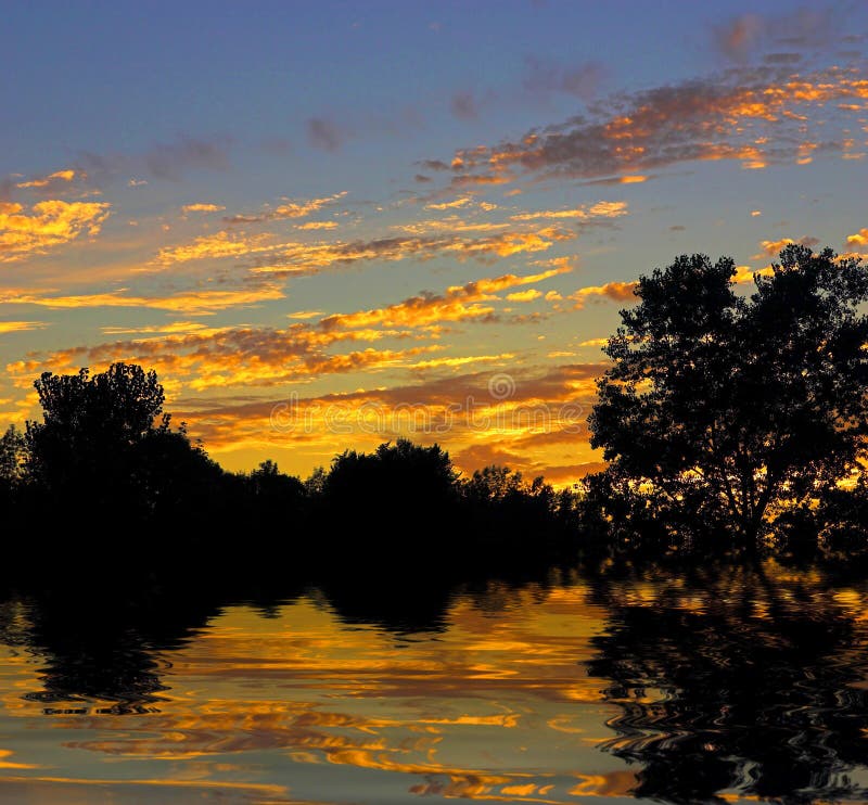 Sunset Reflections stock image. Image of serene, colorful - 1170943