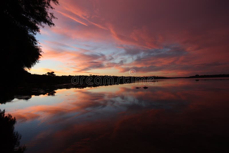 Sunset Reflections stock image. Image of tranquil, pinks - 32639183