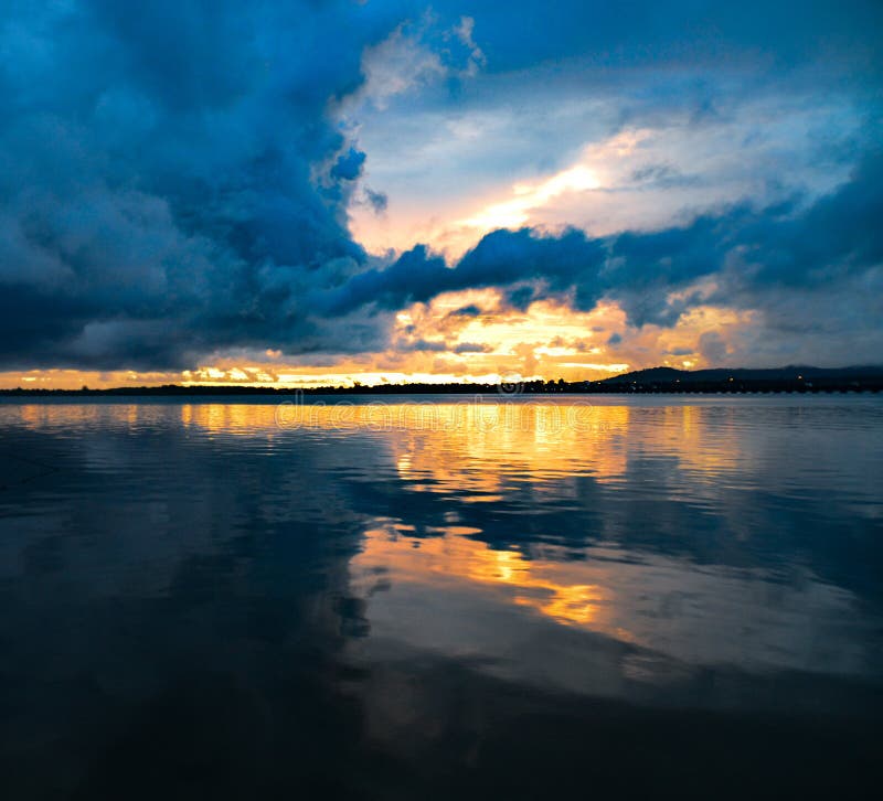 Sunset reflections stock image. Image of travel, tropical - 95418803