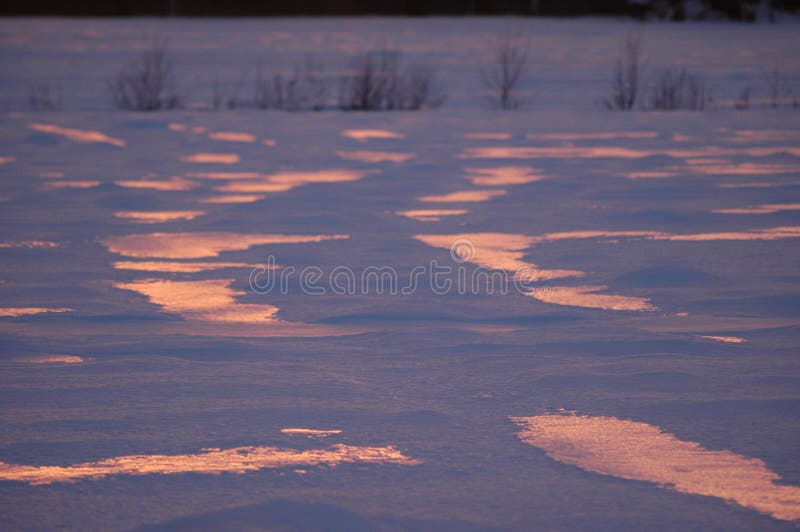 Sunset reflections in snow stock photo. Image of field - 22135608