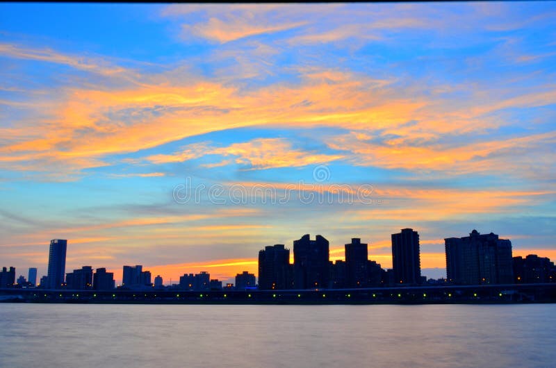 The Sunset Render the Clouds and Cityscape Stock Photo - Image of ...