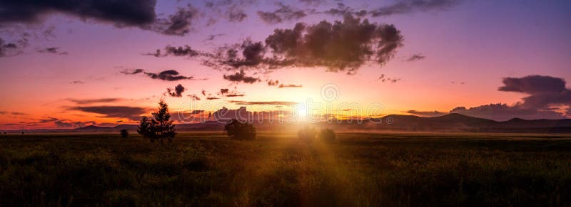 Sunset on the Ridge of the Mountain Stock Photo - Image of ridge, blue ...