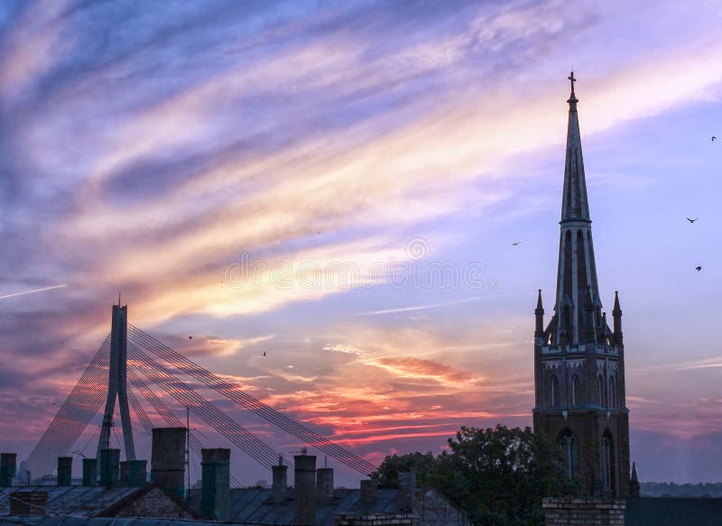 Sunset in Riga stock photo. Image of cable, dusk, construction - 70897674