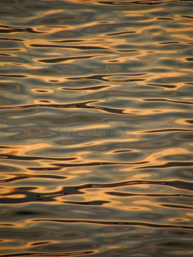 Sunset ripples on sea stock image. Image of colorful - 12158765