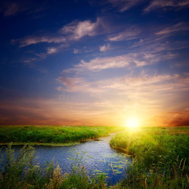 Sunset on the river stock photo. Image of sunny, grass - 16381036