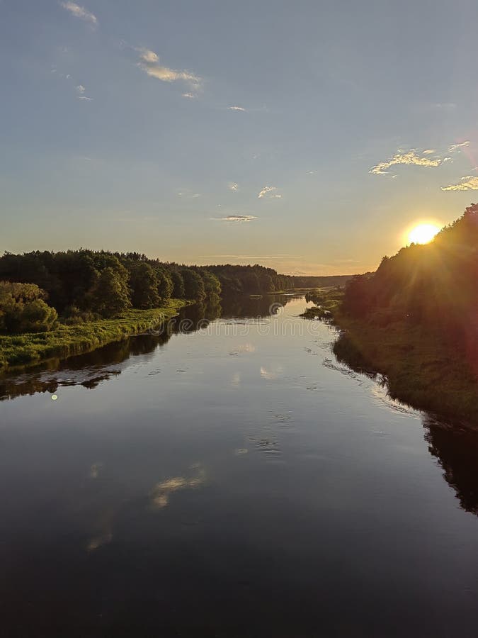 Sunset on the River with Moon Reflection Stock Image - Image of ...