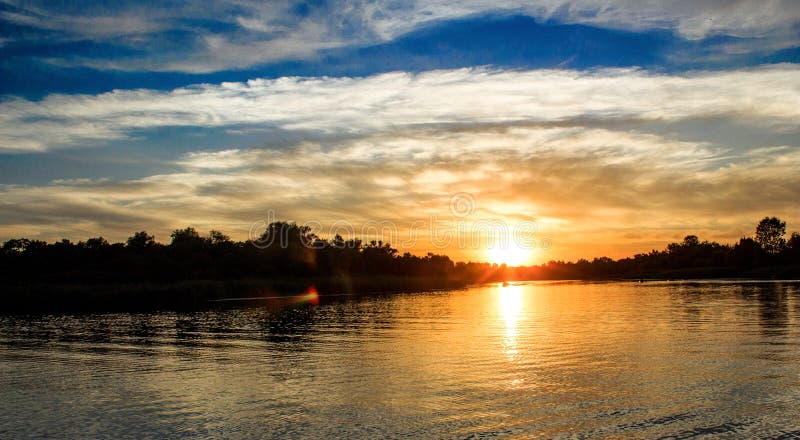 Red Sunset on the River on Summer. Beautiful Vew and Landscape at Nihgt ...