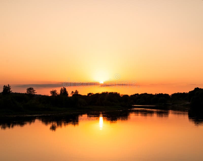 Sunset on the River. the Sun Forms a Reflection on the Water. Stock ...