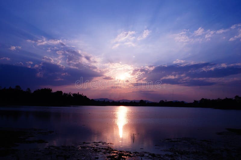 Sunset stock photo. Image of sunset, light, shines, riverside - 126879916