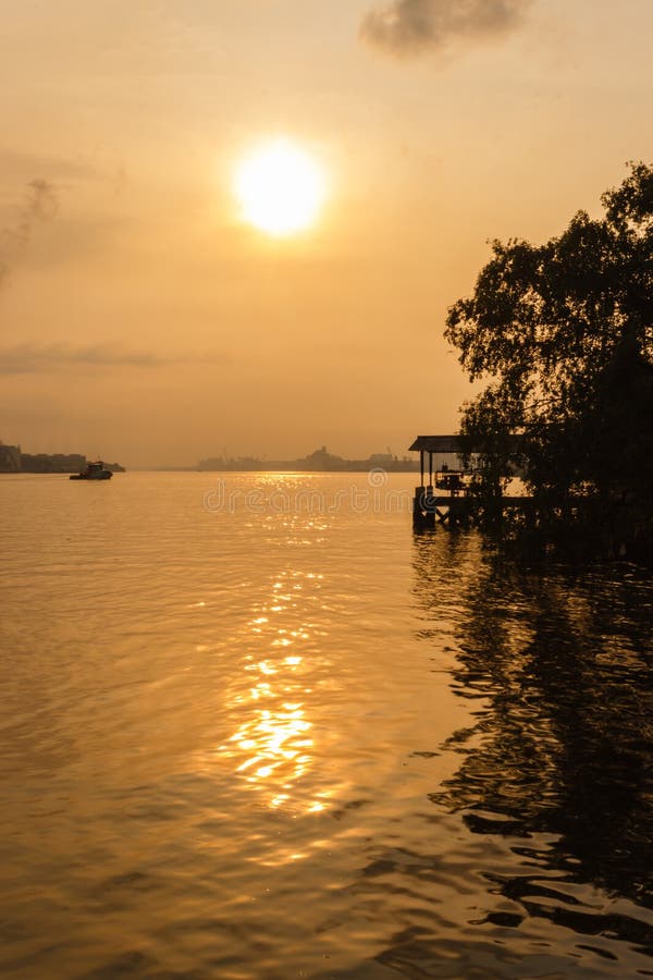 Sunset at riverside stock image. Image of reflection - 29871475