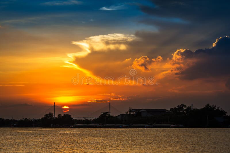 Sunset at riverside stock photo. Image of cloud, sunny - 98803224