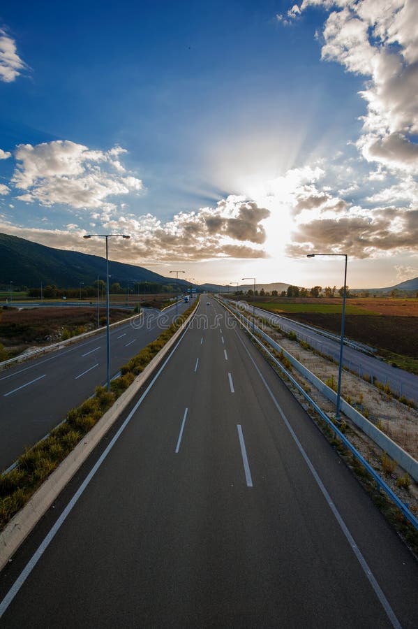 Sunset road stock image. Image of clouds, bright, long - 28373115