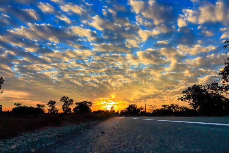 Sunset on road . stock image. Image of horizon, dusk - 76491133