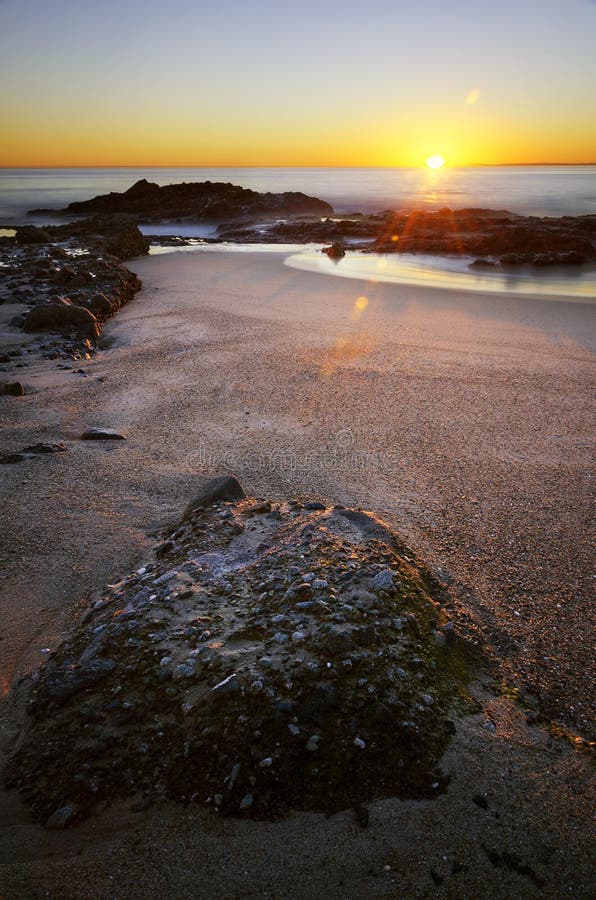 Sunset on Rocks stock image. Image of natural, wave, sand - 28776921