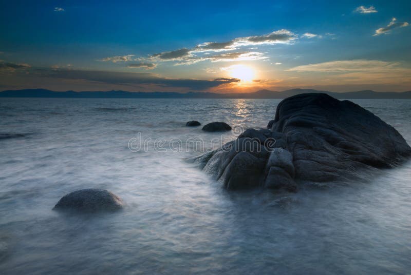 Sunset Rocks stock photo. Image of chimney, time, mist - 7918796