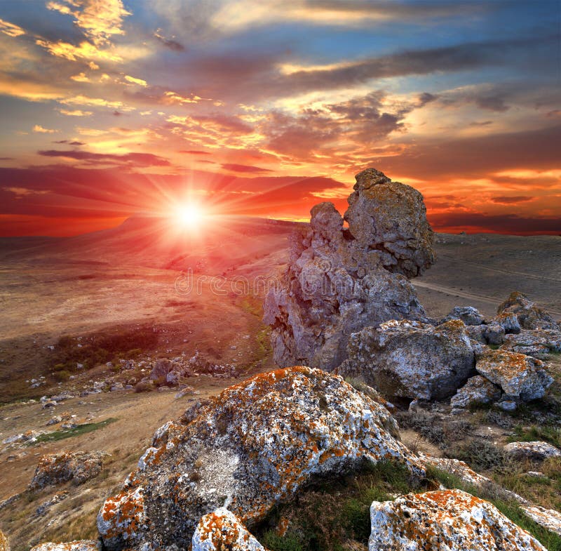 Sunset with rocks stock image. Image of range, scenic - 44610941