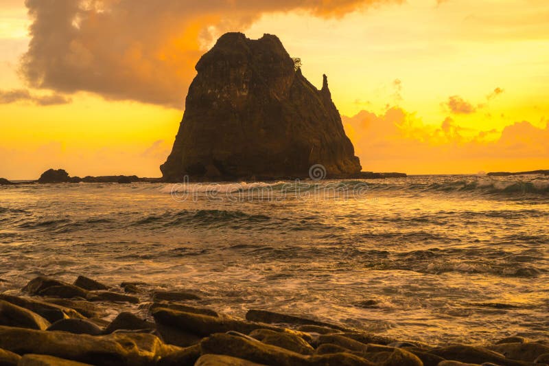 Sunset at the Rocky Beach in Papuma, Jember, East Java, Indonesia Stock ...