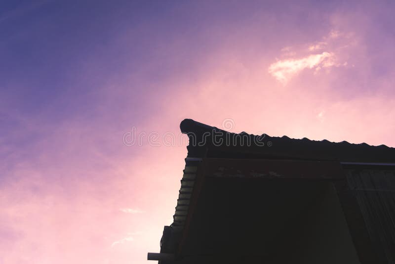 Sunset on Roof of the House Stock Photo - Image of silhouette, cloud ...