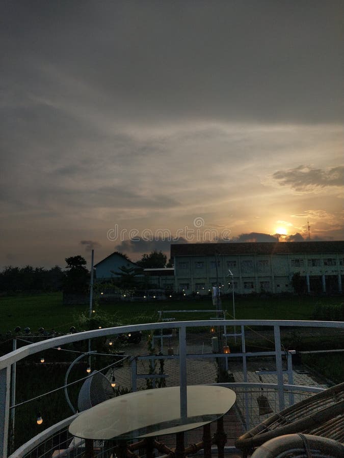 Sunset on the rooftop stock photo. Image of sunset, rooftop - 223098838