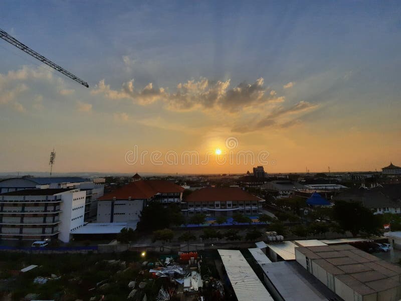 Sunset in rooftop building editorial stock image. Image of dawn - 269890569