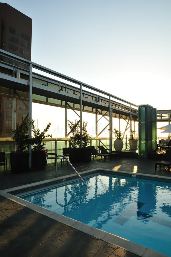 Sunset rooftop pool stock image. Image of clear, balcony - 6943979