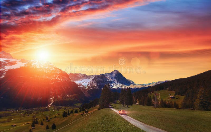 Sunset and a Rout with the Car in it in Grindelwald Stock Photo - Image ...