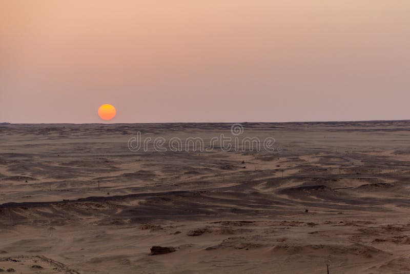 Sunset in the Sahara Desert in Sud Stock Photo - Image of mountain ...