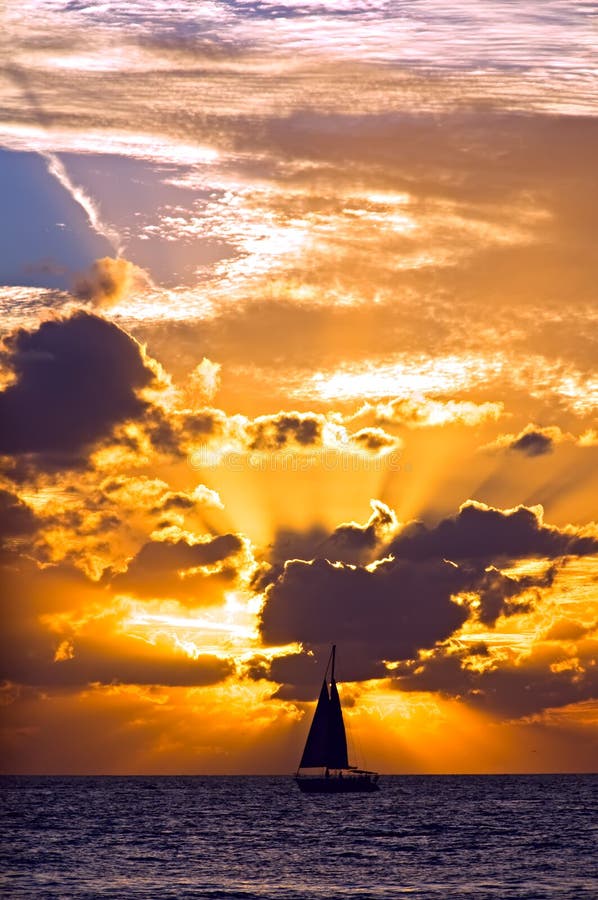 Sunset sail stock image. Image of cloudscape, light, yacht - 12645243