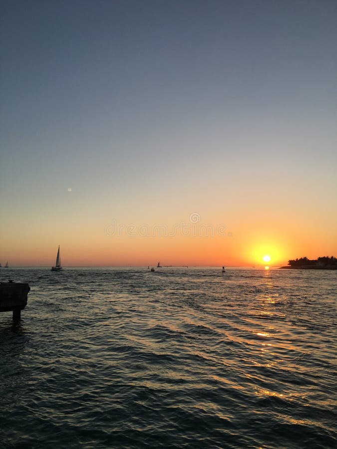 Sunset Sail II stock image. Image of seascapes, cloudy - 25741939