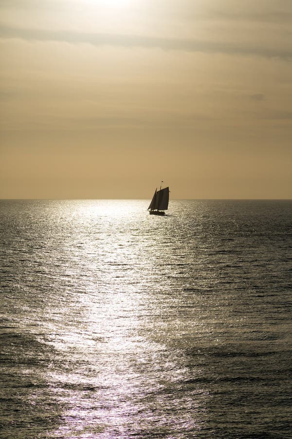 Sunset and Sails stock photo. Image of mast, tall, journey - 68562672