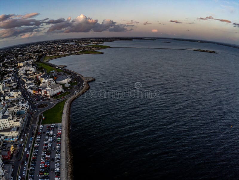 Sunset at Salthill beach stock photo. Image of tourism - 158593172