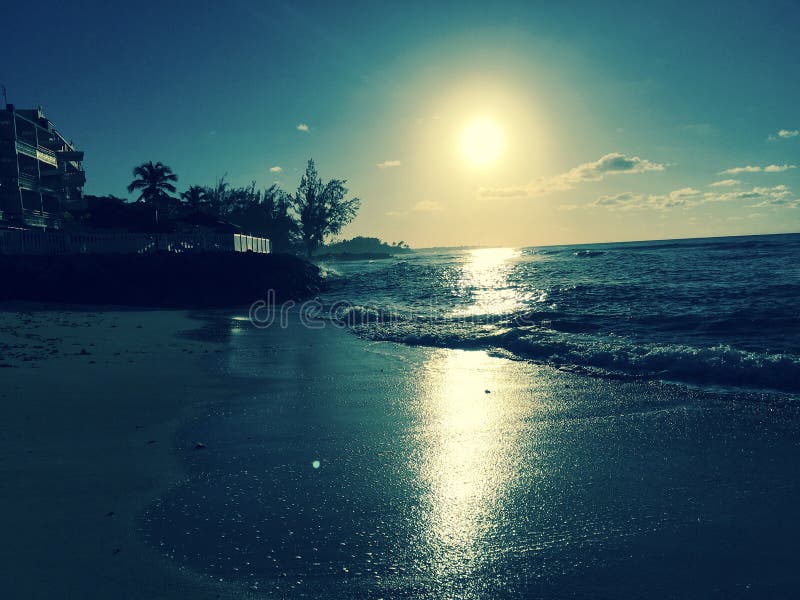 Sunset sand sea stock photo. Image of black, green, happy - 99233292