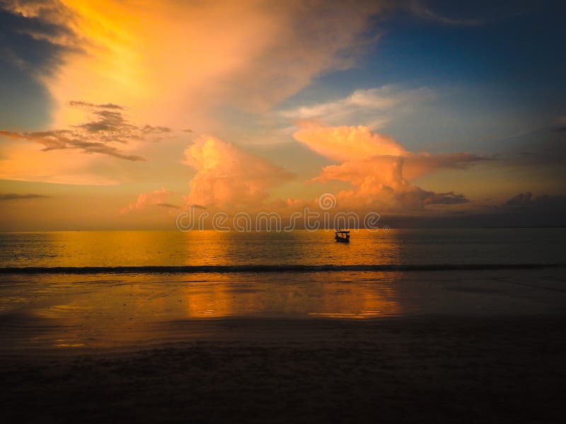 Sunset on the sandy beach stock image. Image of indian - 107442805