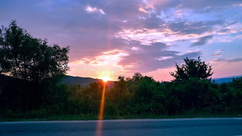 Sunset Scape on a Mountain Road Stock Photo - Image of trees, colors ...